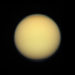 Why Does Titan Have a Dense Atmosphere?